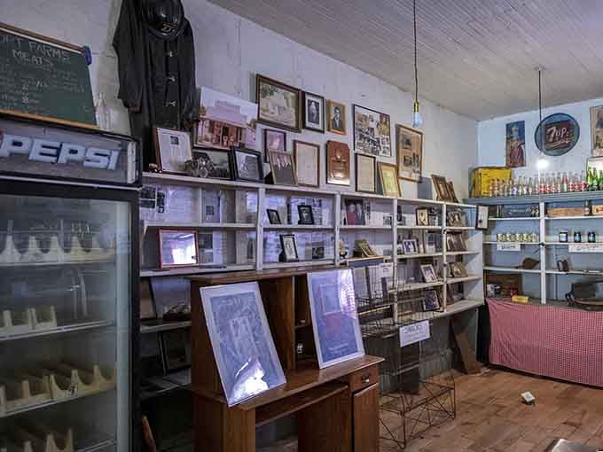 Step inside where old Pepsi signs and antique shelves preserve small-town history under creaky wooden floors.