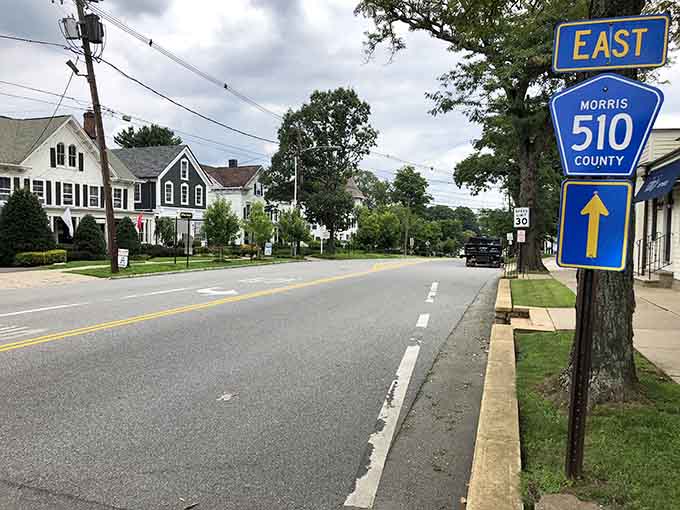 When the county route sign becomes your landmark, you know you've found a place where rush hour means three cars.