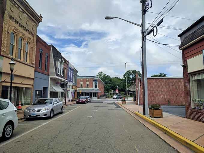 This quiet Main Street stretches into the distance, empty and peaceful as a Sunday morning in Mayberry itself.