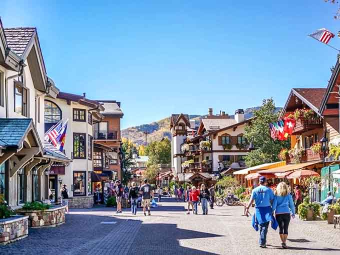 European-style buildings line walkways where flowers bloom and distant peaks wear their snowy caps year-round.