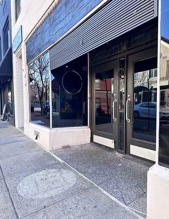 That minimalist storefront in daylight reveals a restaurant where East meets West in the most delicious ways imaginable.