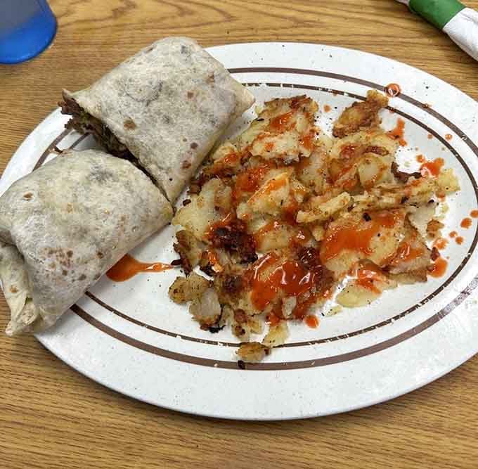 A Philly cheesesteak with perfectly crispy hash browns &ndash; because lunch items at breakfast time is totally allowed here.