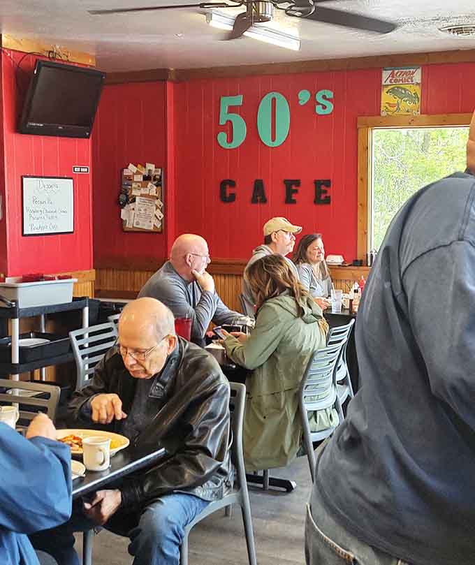 The packed dining room with that vibrant red wall tells you locals know exactly where to find authentic comfort.