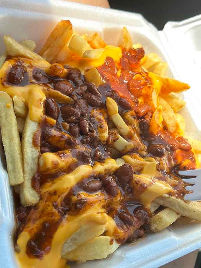 Chili cheese fries that look like they're auditioning for a comfort food hall of fame—and they're getting in.