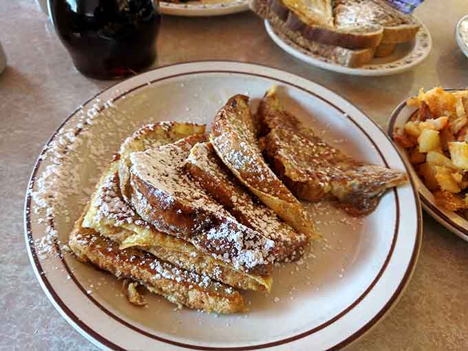 French toast dusted with powdered sugar, because some mornings demand a little extra sweetness.