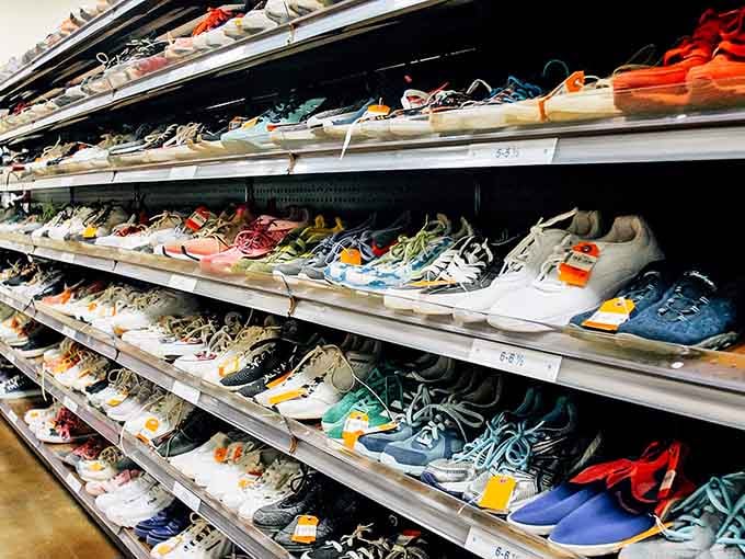 Footwear for every occasion lines these shelves, from sneakers to dress shoes, all waiting for new adventures.