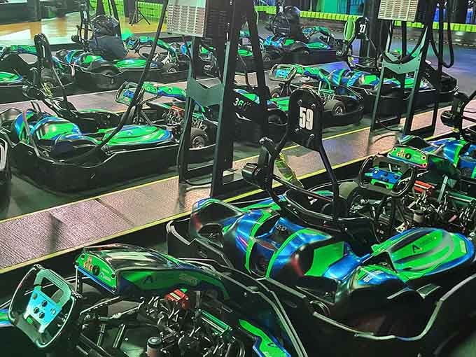 A fleet of karts waiting patiently for their next drivers, like caffeinated racehorses chomping at the bit.