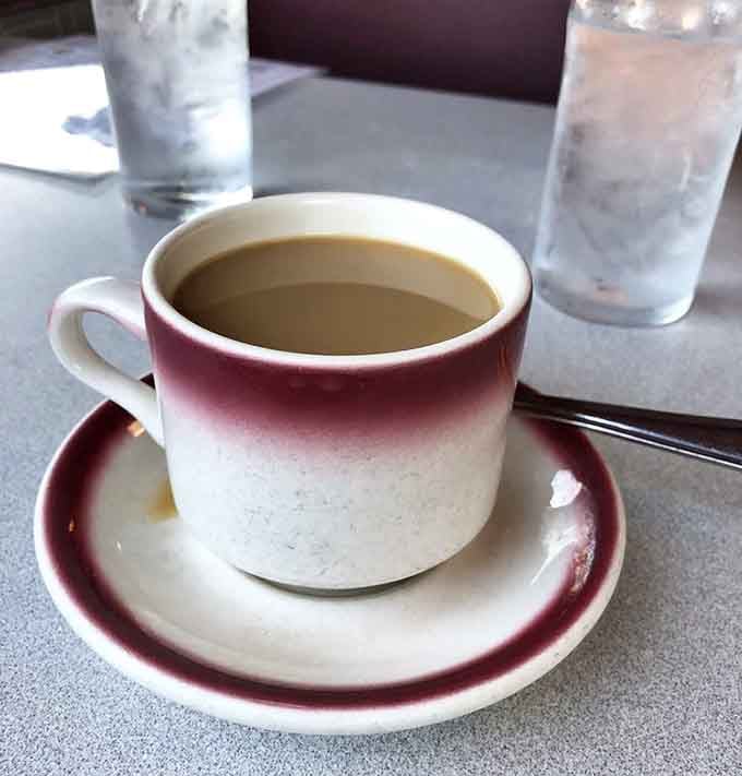 Simple diner coffee in a classic cup, the kind that's fueled American conversations since forever.