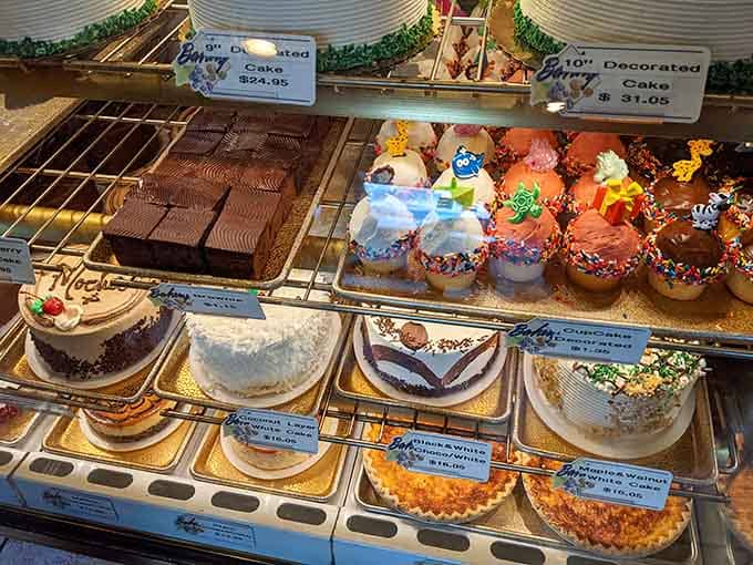 A rainbow of decorated treats proving that sometimes playing with your food is absolutely the right decision.