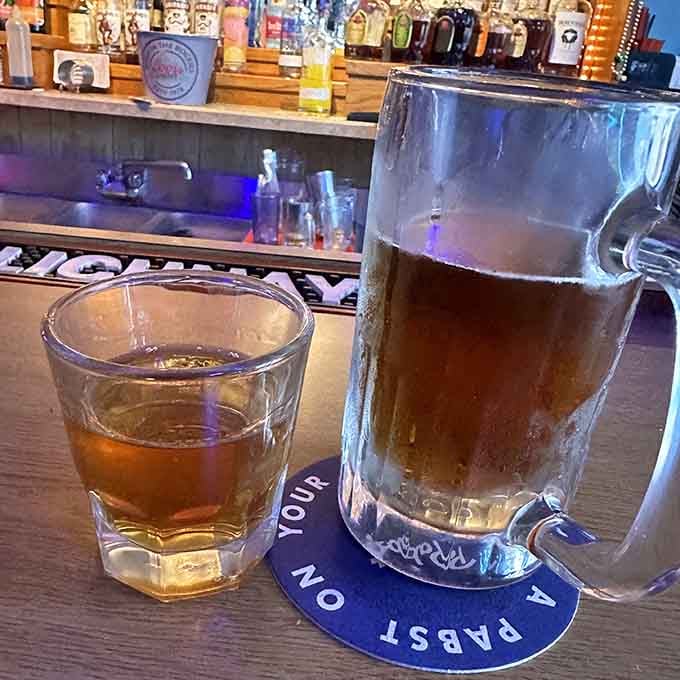 Cold beer and a shot waiting patiently, because wings this good deserve proper liquid accompaniment always.