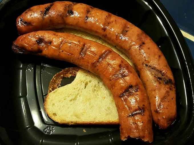 Smoked kielbasa with char marks that tell the story of hours spent over real wood smoke.