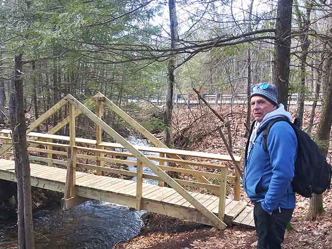 A simple footbridge over a forest stream proves that great adventures don't require complicated equipment or planning.