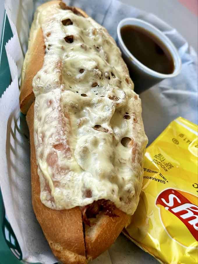 A French dip sandwich on fresh-baked bread with melted cheese that stretches like your favorite childhood memories.