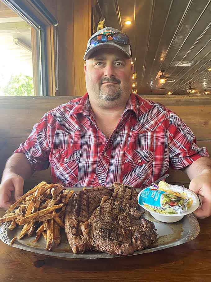The smile says it all when you're facing down a steak that could feed a small village.