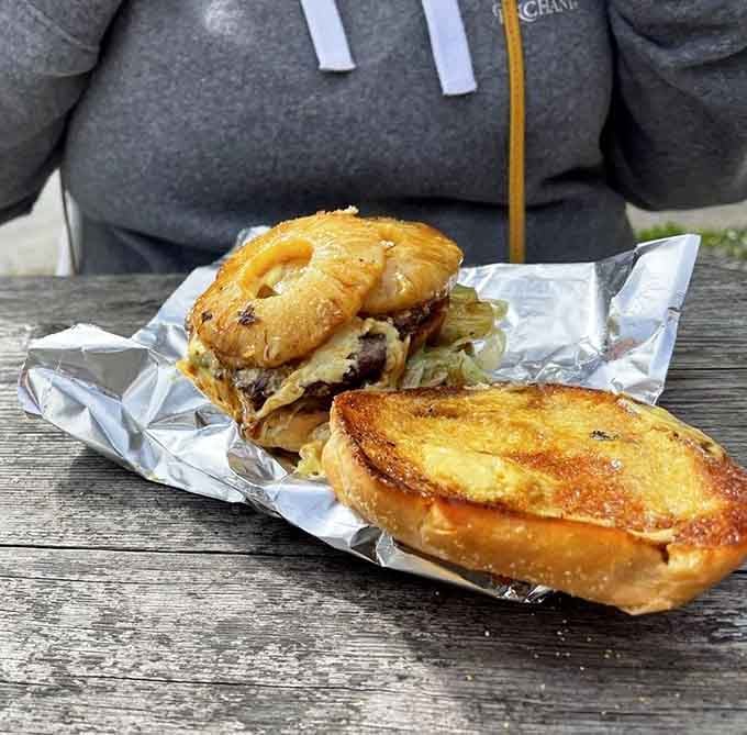 The Hawaiian burger adds sweet pineapple and savory bacon, creating a flavor combination that shouldn't work but absolutely does.