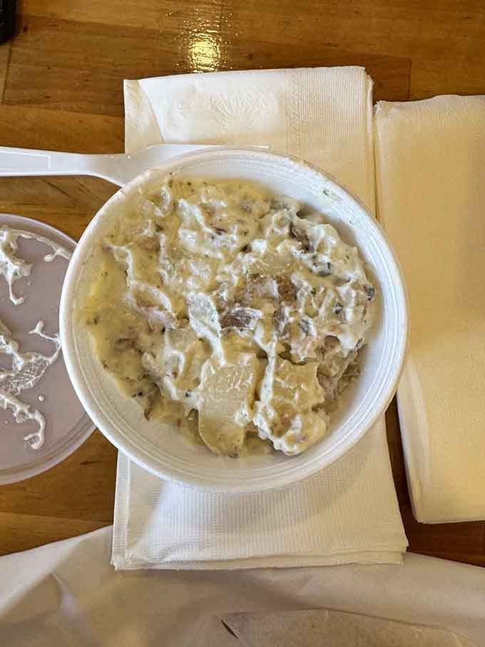 Loaded potato salad that looks this creamy and generous makes you question every picnic you've ever attended before this moment.