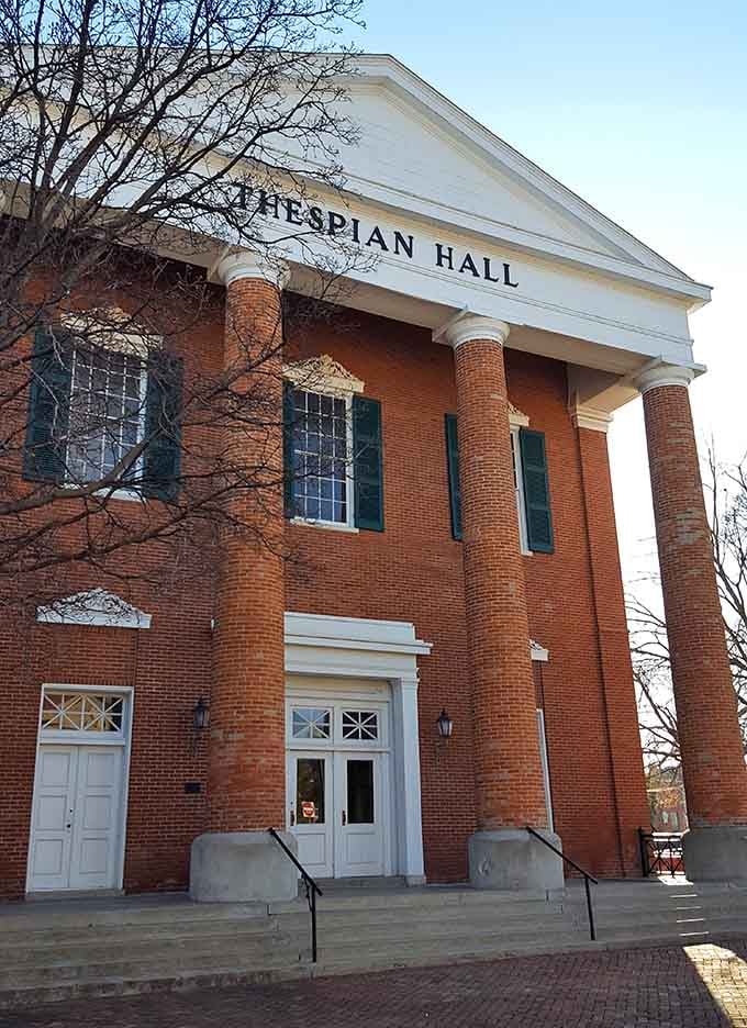 Thespian Hall's Greek Revival columns have welcomed theater lovers for generations, proving entertainment never goes out of style.