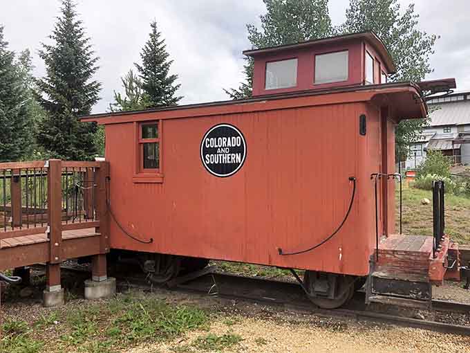 The Colorado and Southern caboose sits proudly in its signature orange, looking remarkably good for its considerable age.