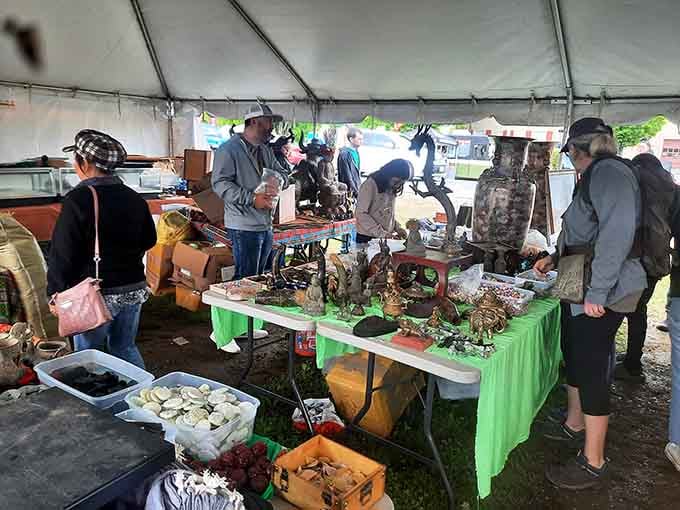 Shoppers browse under canvas, hunting for that perfect piece they didn't know they needed until right now.