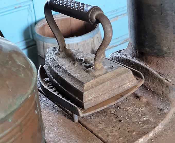 Before electric irons, getting wrinkles out meant heating heavy metal and praying for steady hands.