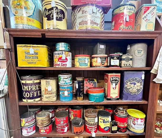 Vintage coffee and tea tins line up like colorful soldiers, their graphics more artistic than any modern packaging design.