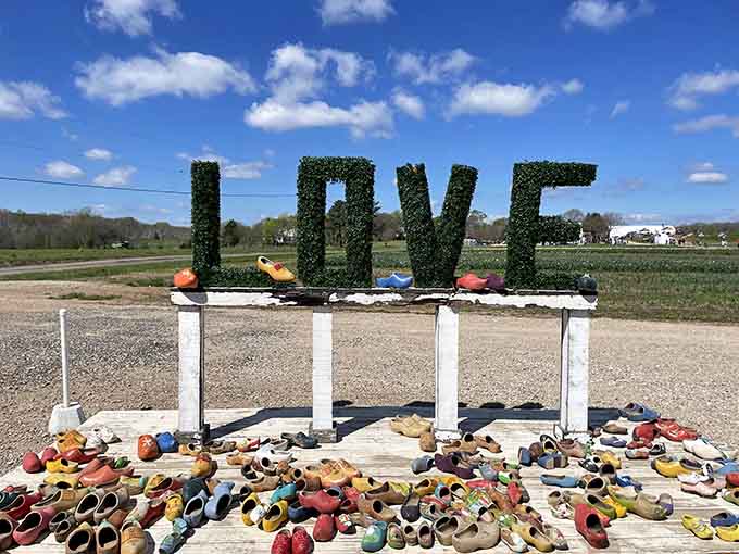 The LOVE sign surrounded by wooden clogs celebrates romance with a quirky international twist that's absolutely Instagram gold.
