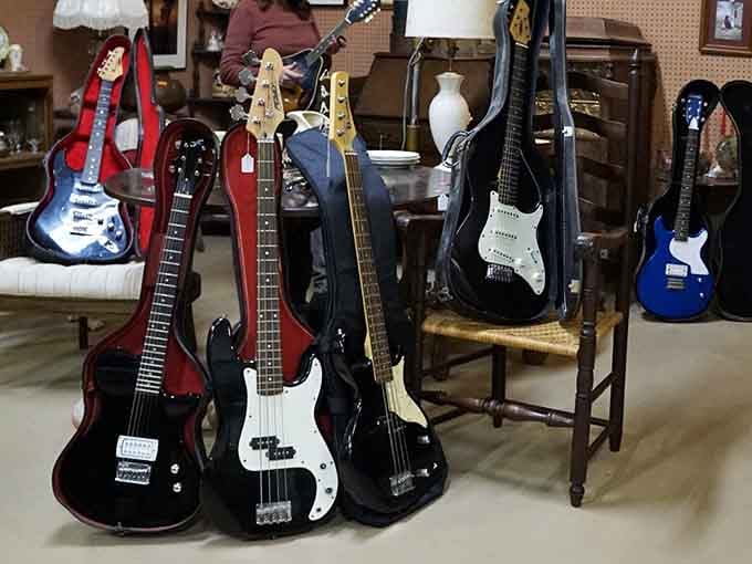 Guitars lined up like a rock band reunion tour waiting to happen in your garage.