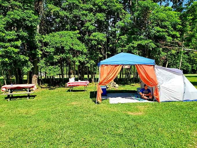 Camping with a canopy because roughing it doesn't mean you can't have a little shade and style.