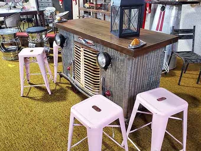Someone brilliantly transformed a vintage truck grille into a bar table that screams creative genius loudly.