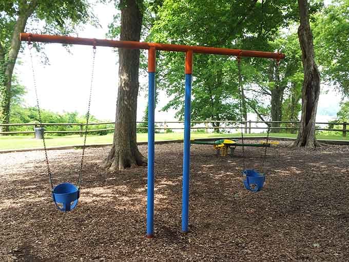 Where little ones can swing with a Mississippi River backdrop that beats any suburban playground's chain-link view.