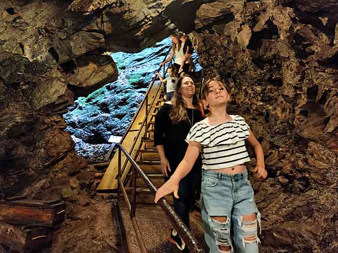 Visitors explore the cavern's natural beauty, discovering why miners were willing to work in such conditions.