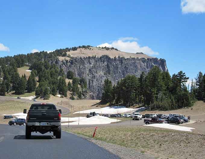 Even the parking area offers mountain views that beat most destinations' main attractions by a mile.