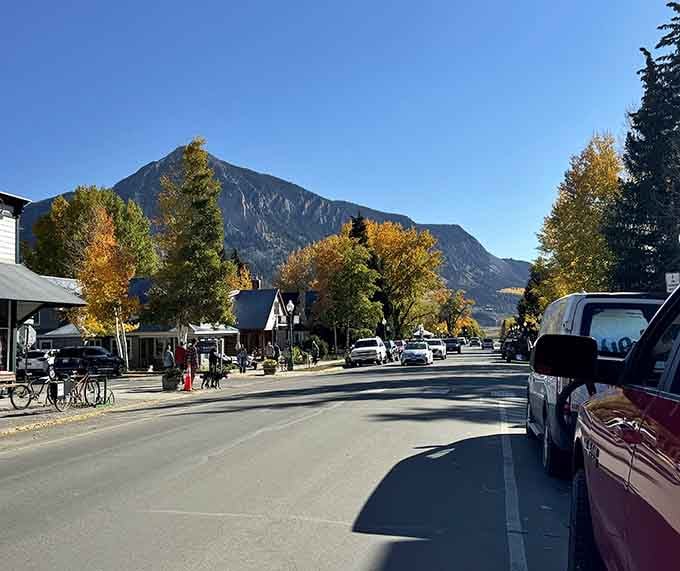 Fall transforms Elk Avenue into a golden corridor where aspens steal the show from the shops.