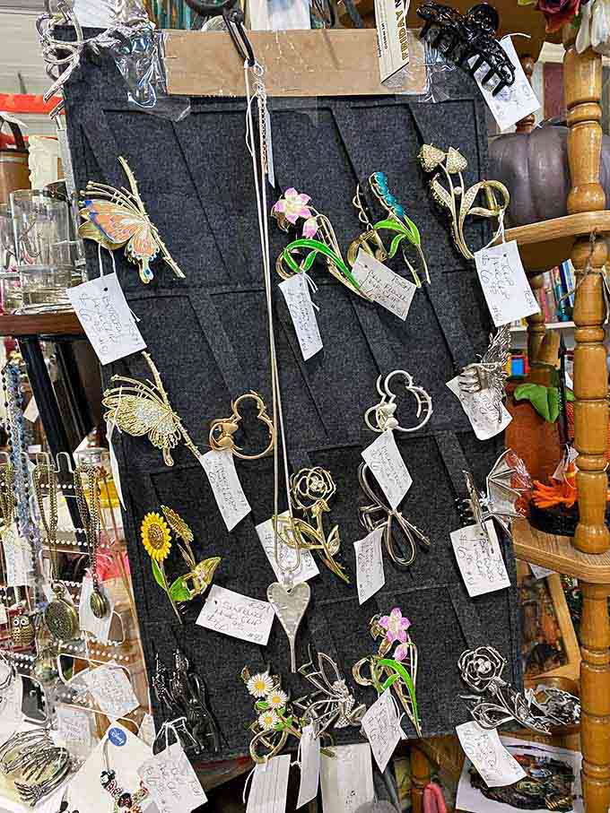 Delicate hair clips and brooches showcase the kind of detailed metalwork that modern fast fashion forgot how to create.