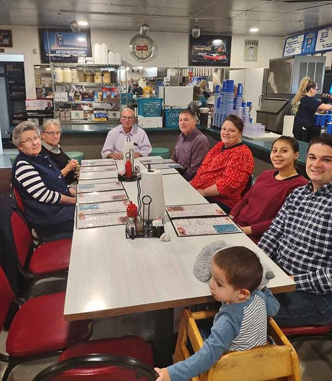 Three generations sharing a meal in a retro diner is basically a Norman Rockwell painting come to life, with better food.