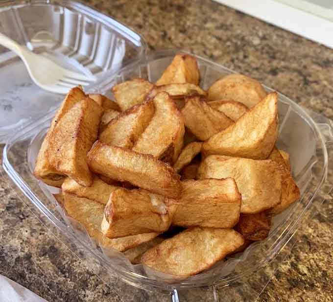 Thick, golden potato wedges that make you wonder why you ever settled for anything less satisfying than this.