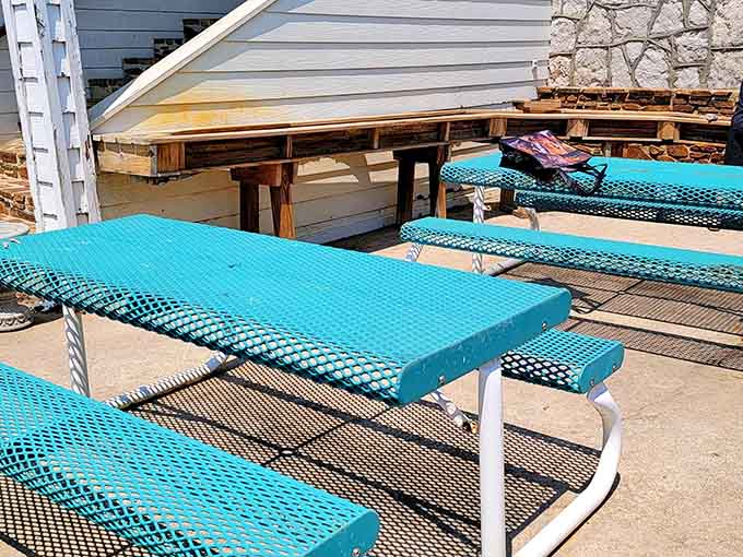 Bright picnic tables offer the perfect spot to relax and discuss the geological wonders you just witnessed down below.