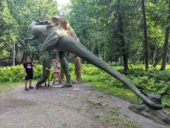 Two titans face off in the forest, frozen in time and ready for their close-up with visitors.