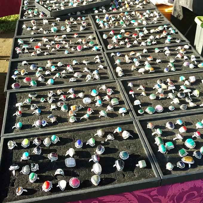 A dazzling array of vintage rings sparkles under the sun, each one holding decades of untold stories.