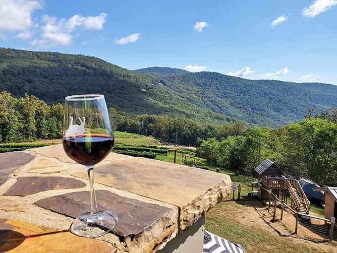 Red wine, stone ledge, mountain panorama, sometimes the simple moments are the ones that stick with you forever.