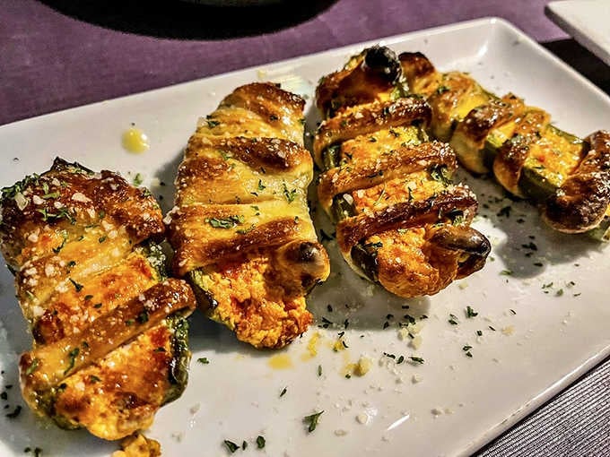Jalape&ntilde;o poppers twisted into submission and ready to breathe fire right back at any fire-breathing dragon pizza nearby.