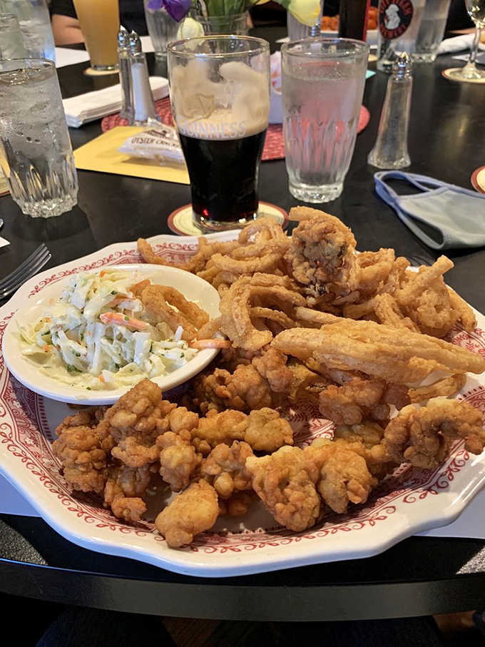 This fried seafood platter brings the ocean to your table with clams, oysters, and enough coleslaw to balance it all.