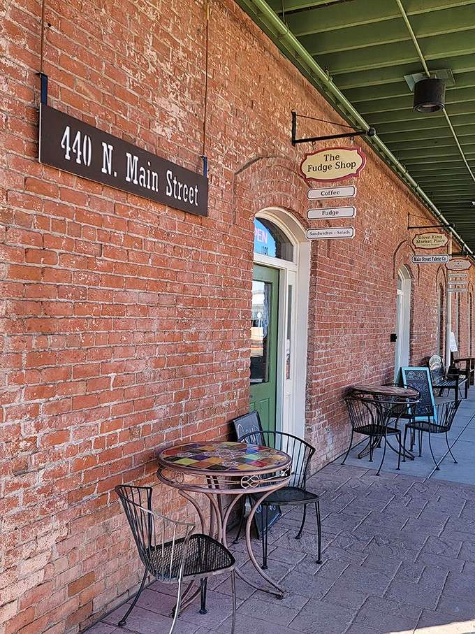 The Florence Fudge Shop's brick facade and outdoor seating invite leisurely afternoons of sweet indulgence.