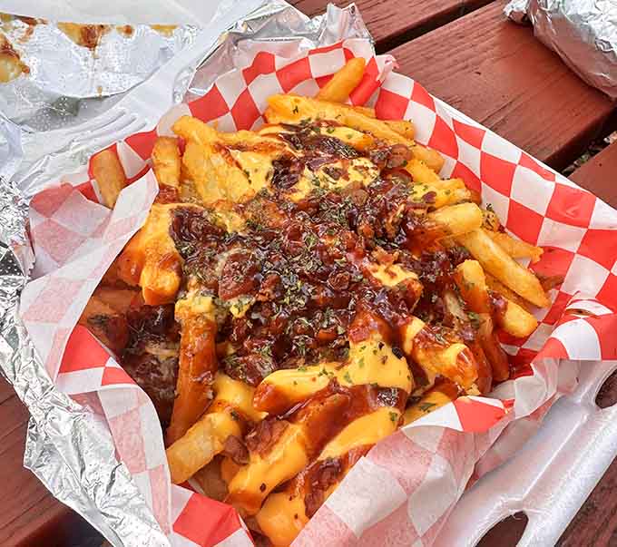The Famous Dirty Jersey Fries are a glorious mess of garlic sauce and crispy goodness you'll dream about.