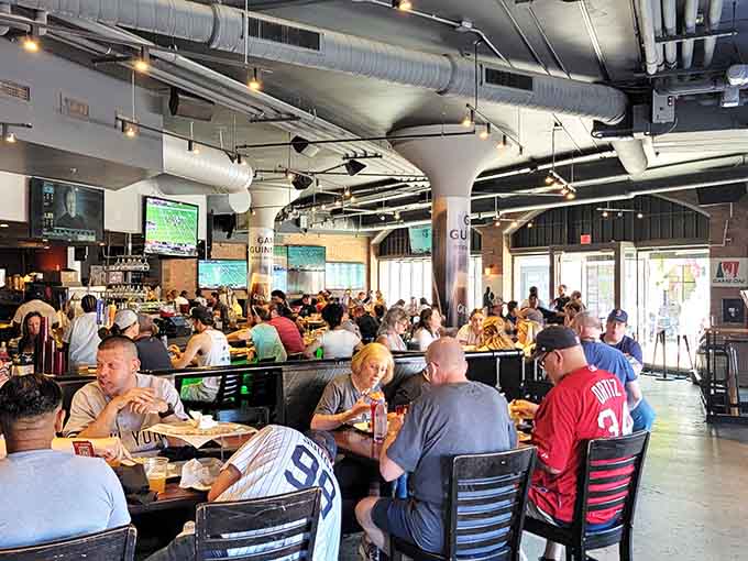 Packed tables and engaged fans create the communal atmosphere that makes watching sports better than doing it alone at home.