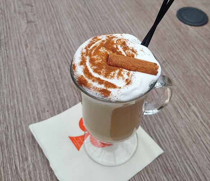 Pumpkin spice latte topped with whipped cream and cinnamon proves this tavern does more than just chicken.