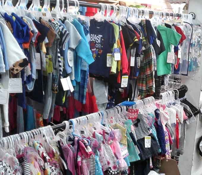 Kids' clothing racks packed with options that let parents say yes without checking their account balance.
