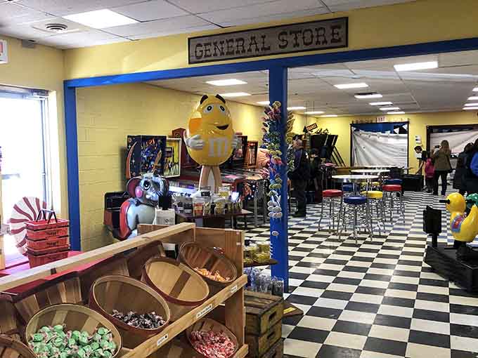 The "General Store" sign presides over a candy kingdom where giant M&M characters stand guard over your sweetest dreams.