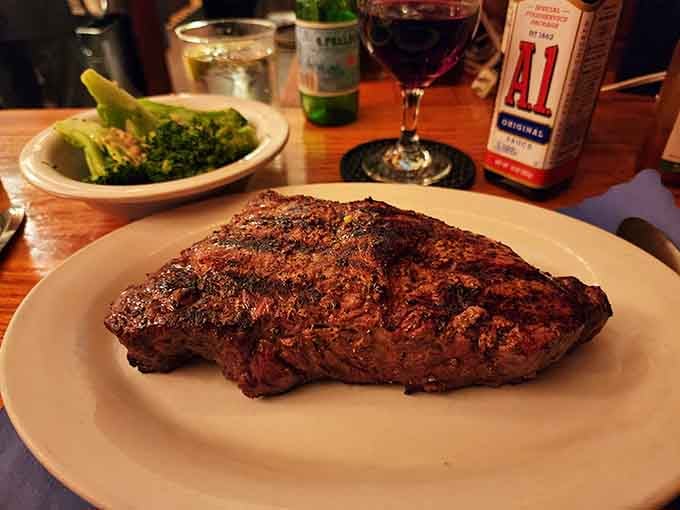 This New York sirloin strip has the kind of char marks that make vegetarians momentarily question their life choices.
