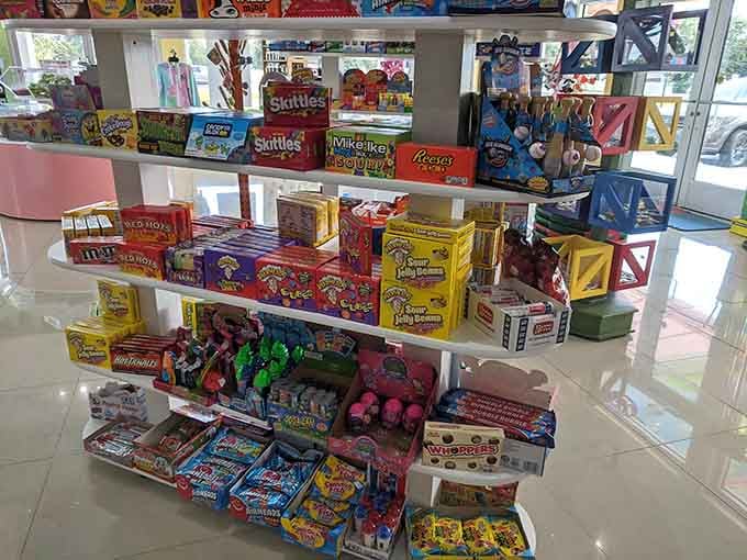 Pure imagination comes to life here with rows of vibrant gummies and shimmering taffy that practically scream sugar rush.
